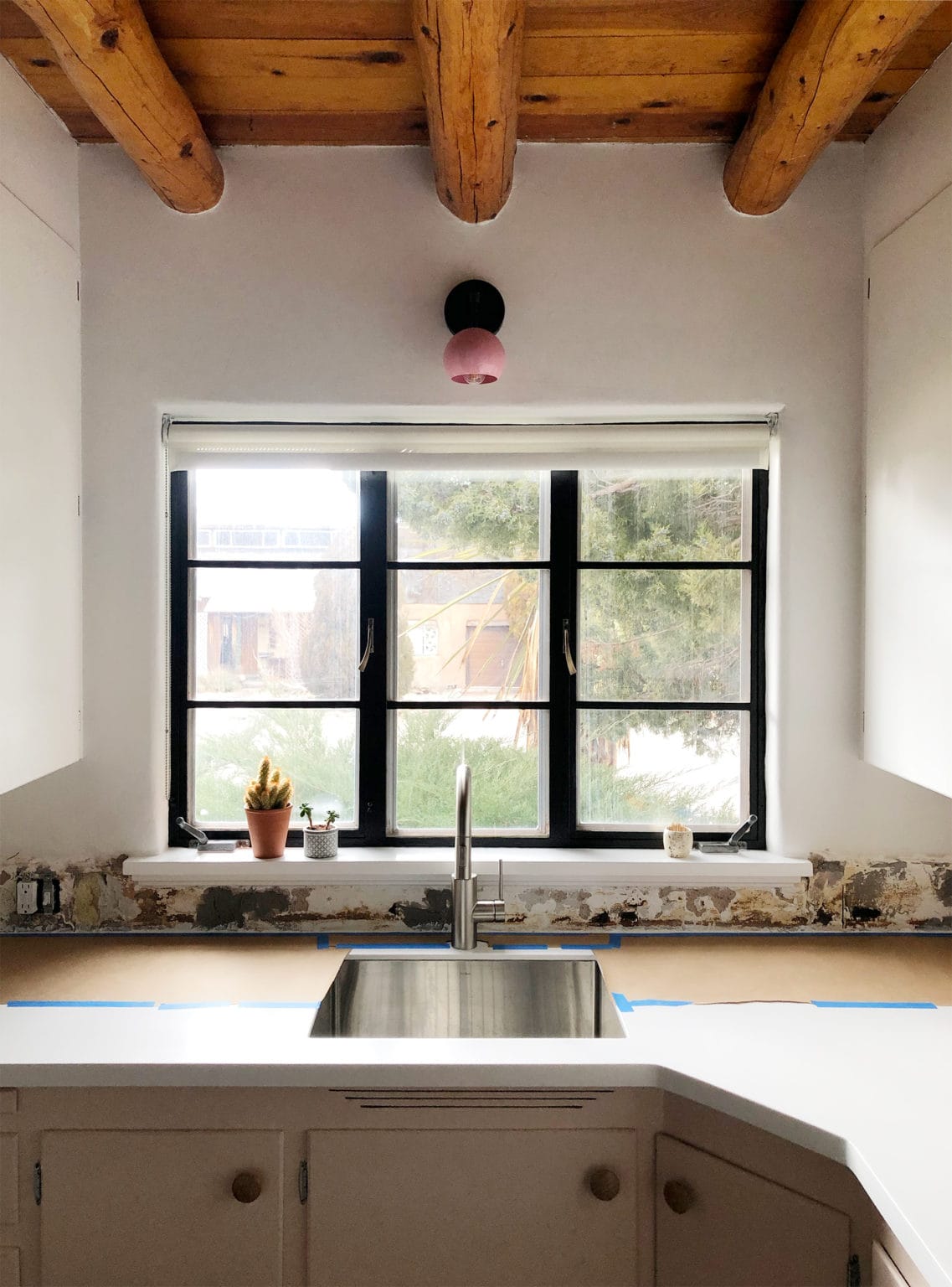 Installing a stacked bond subway tile backplash. | Door Sixteen