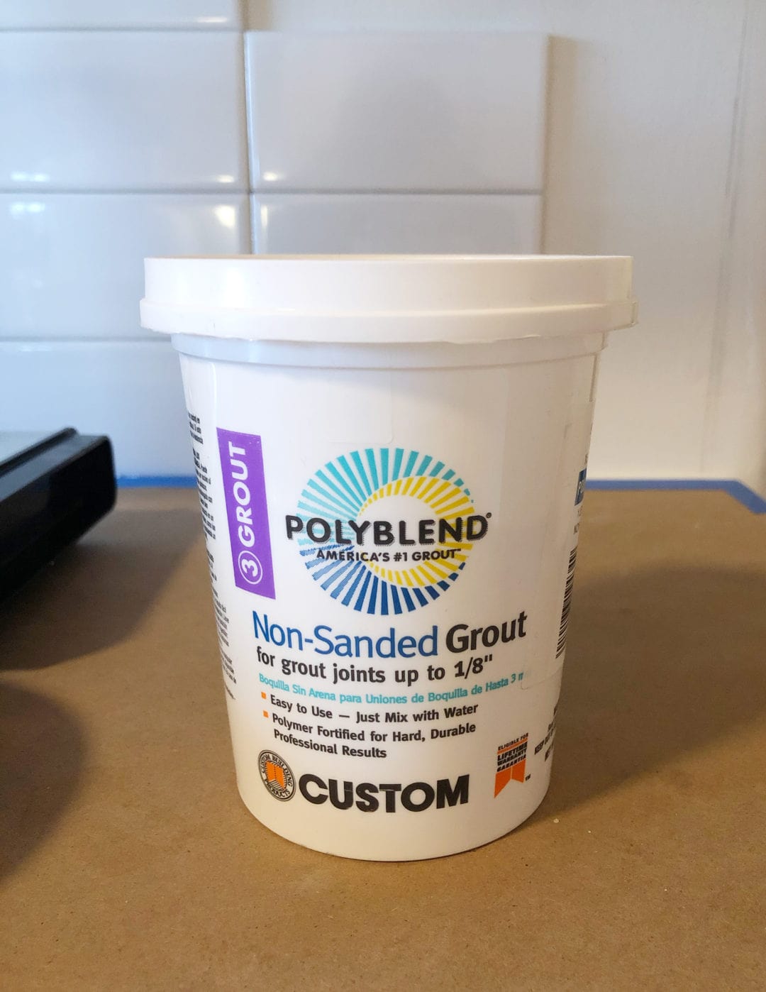 Installing a stacked bond subway tile backplash. | Door Sixteen